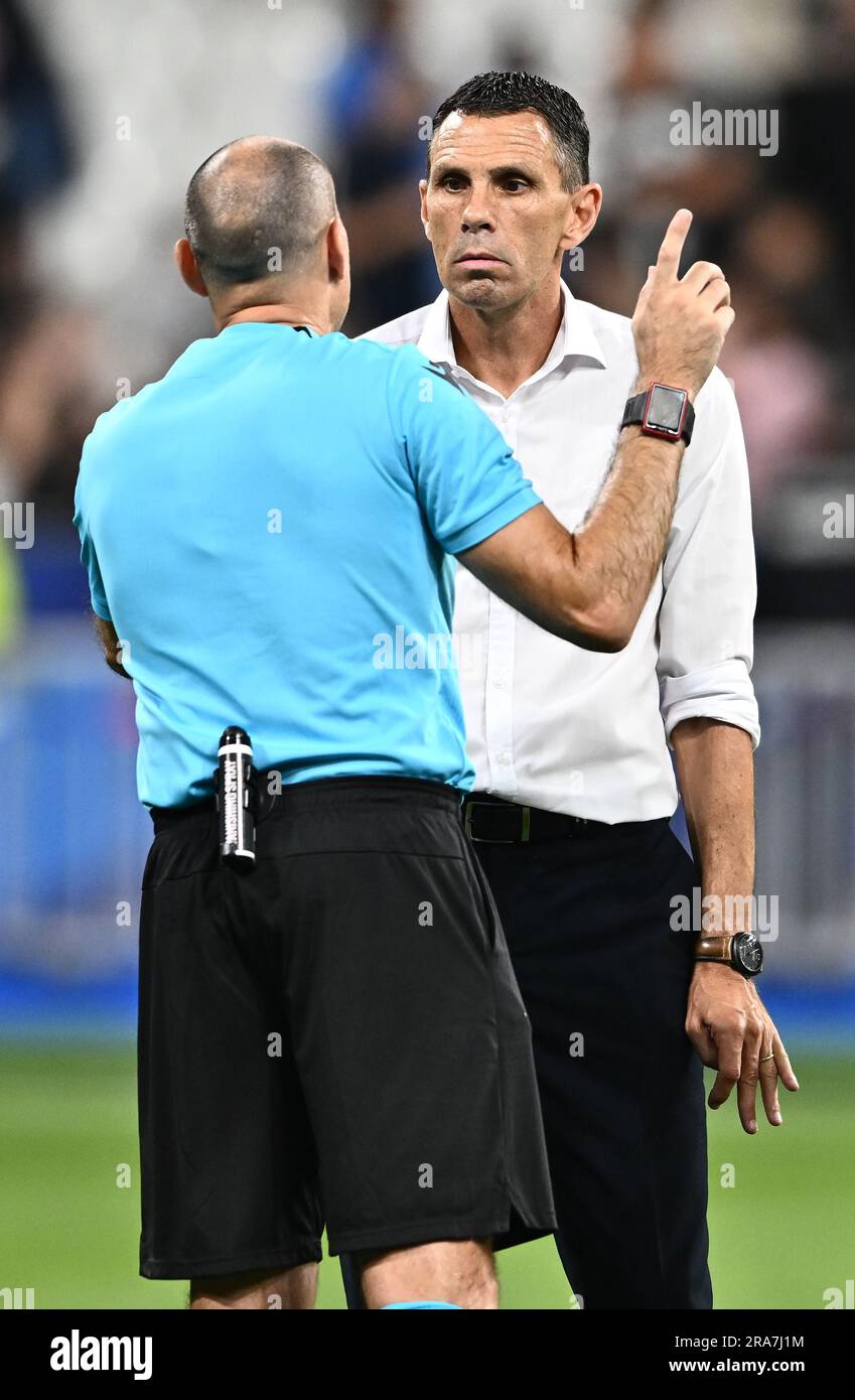 PARIS, FRANCE - JUNE 19: referee Mateu Lahoz and head coach Gus Poyet ...