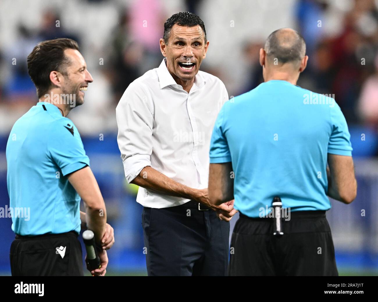 PARIS, FRANCE - JUNE 19: referee Mateu Lahoz and head coach Gus Poyet ...