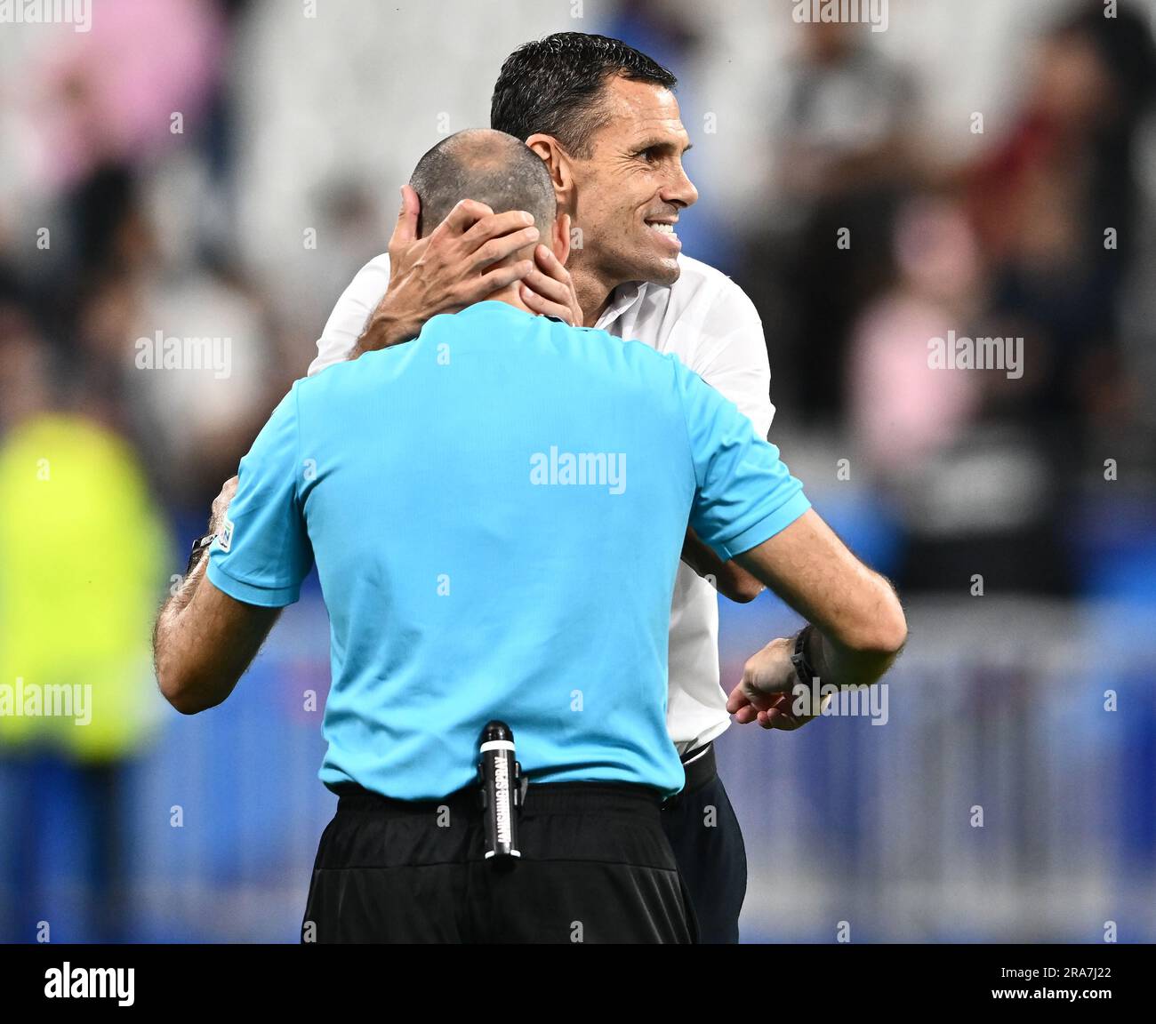 PARIS, FRANCE - JUNE 19: referee Mateu Lahoz and head coach Gus Poyet ...