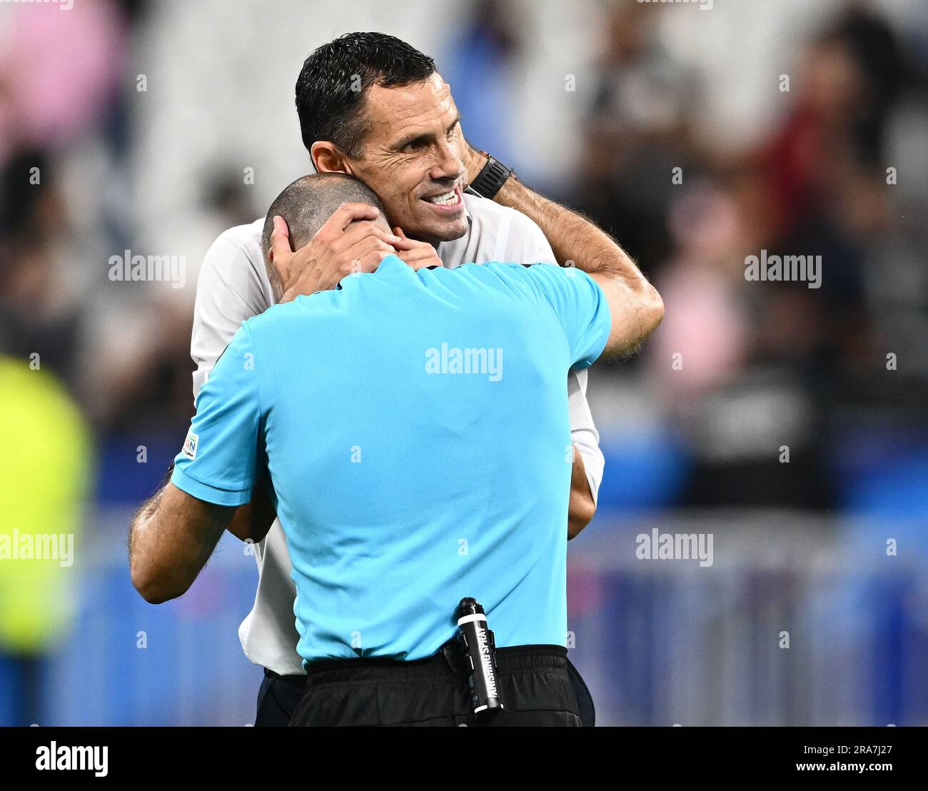 PARIS, FRANCE - JUNE 19: referee Mateu Lahoz and head coach Gus Poyet ...