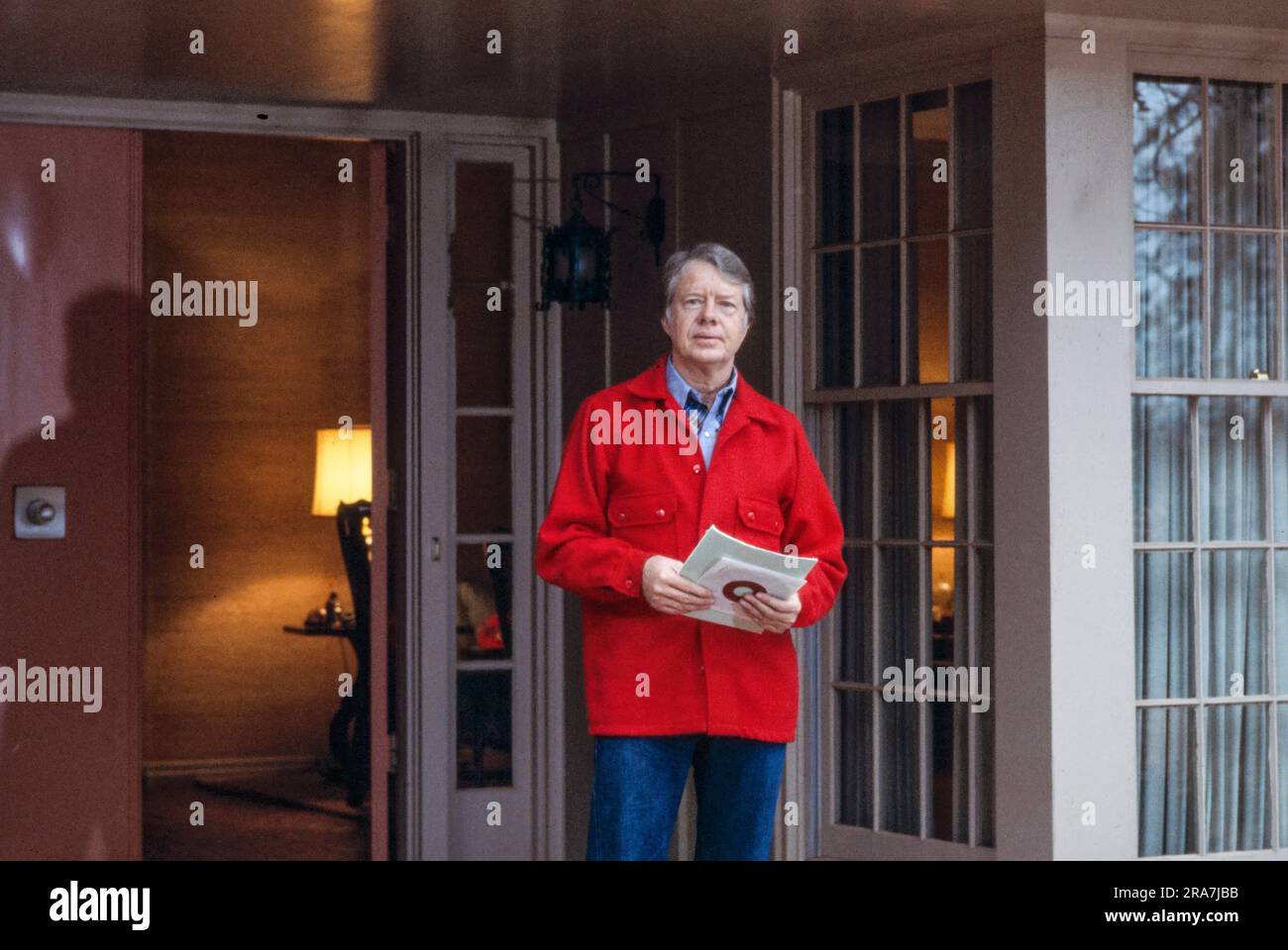 President Jimmy Carter, standing at the front door of his Plains, GA ...