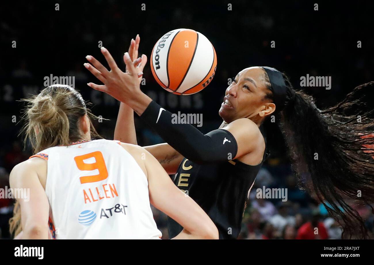 Las Vegas Aces forward A'ja Wilson, right, pulls in a rebound by ...