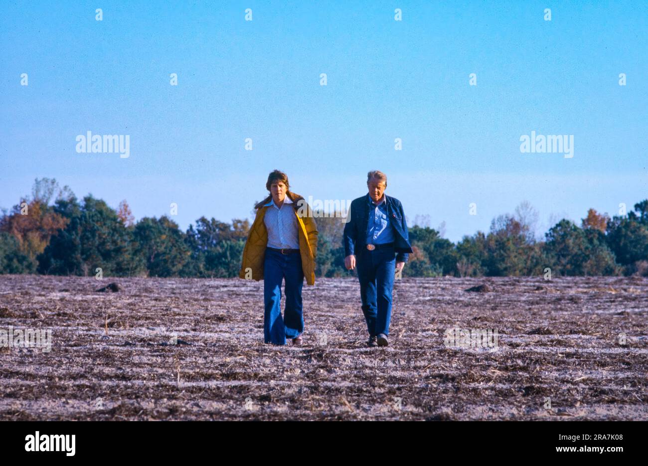 President Jimmy Carter and his son, Chip Carter, walk the dormant ...