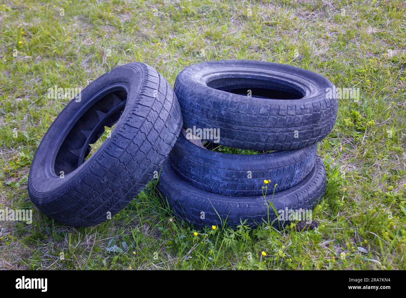 Old car tires, a pile of old car tires, a dump of worn-out tires from used cars Stock Photo - Alamy