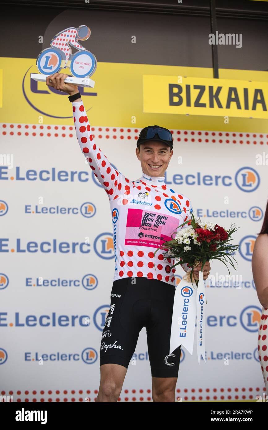 Neilson Powless on the podium in Bilbao with the 2023 Tour de France ...