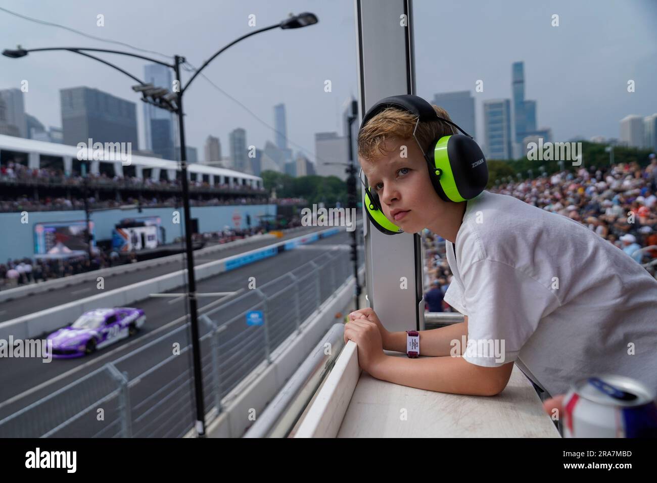 Seven-year-old Sebastian Miller watches the Loop 121 NASCAR Xfinity ...