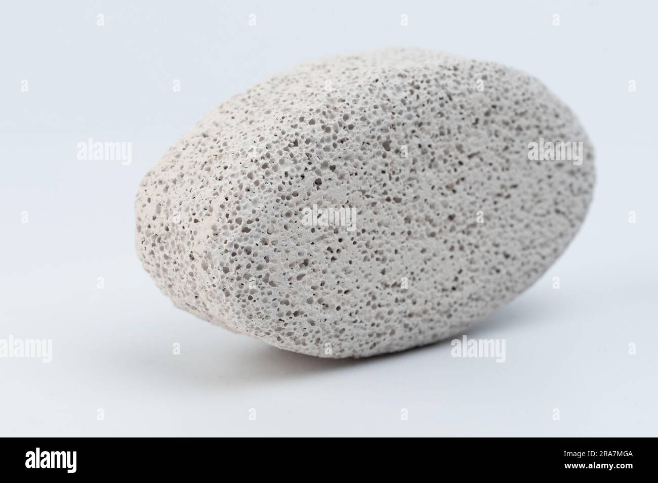 Close-up of small round object made of cement or stone with Rough and ...