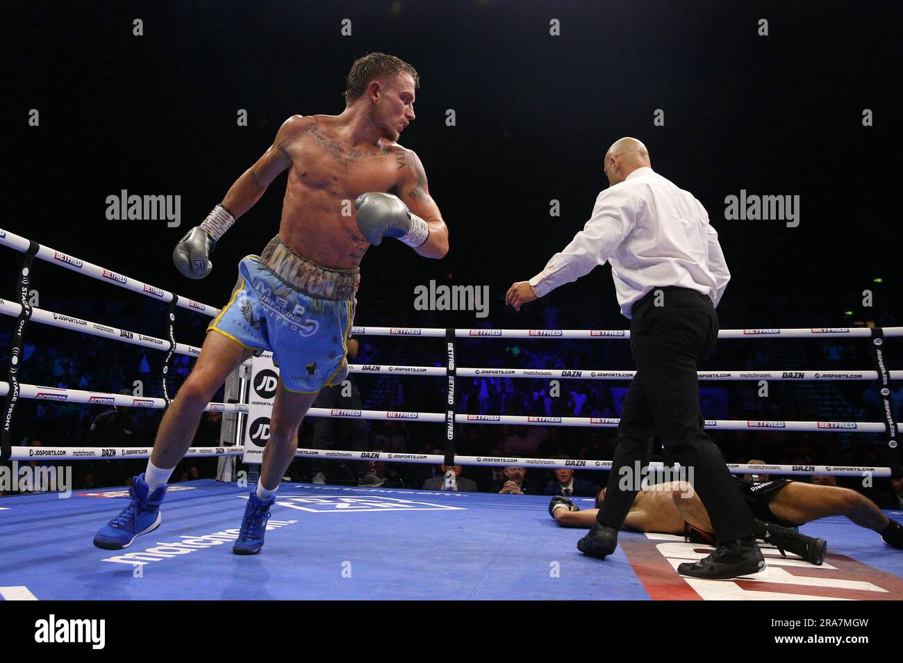 Dalton Smith (left) celebrates knocking out Sam Maxwell during their ...