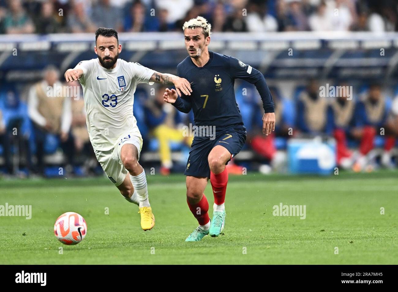 PARIS, FRANCE - JUNE 19: Manolis Siopis of Greece and Antoine Griezmann ...