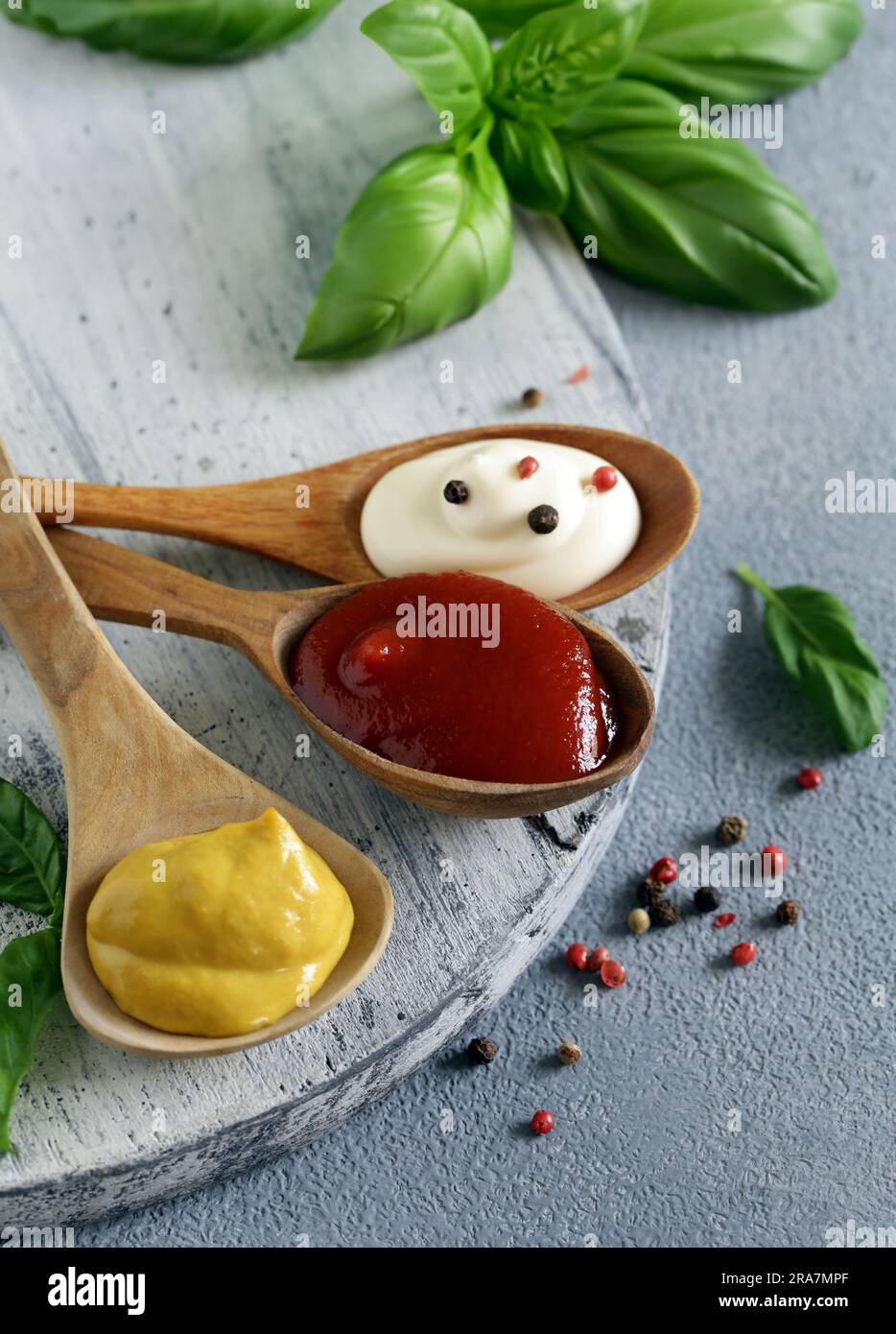 three variants of ketchup, mustard and mayonnaise sauce Stock Photo - Alamy