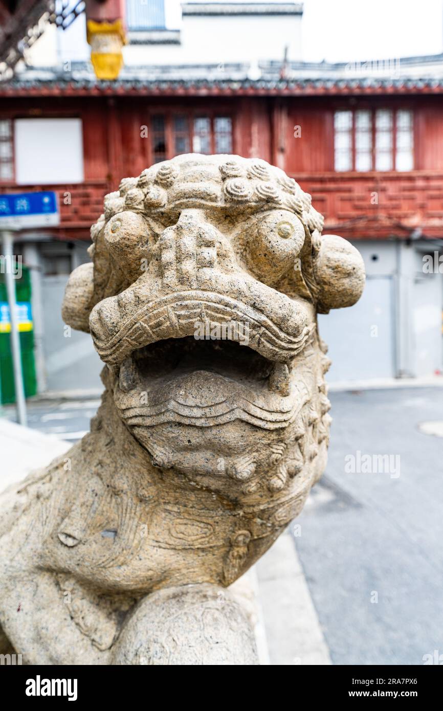 Lion head statue in front of Danfeng Lu in the Old Town part of Huangpu ...