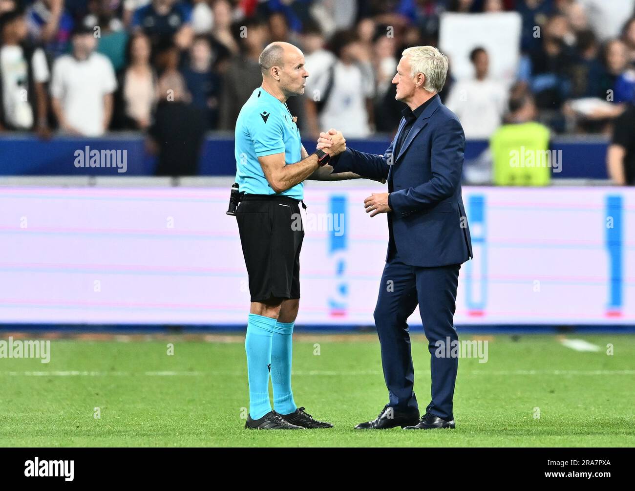 PARIS, FRANCE - JUNE 19: referee Mateu Lahoz and head coach Didier ...