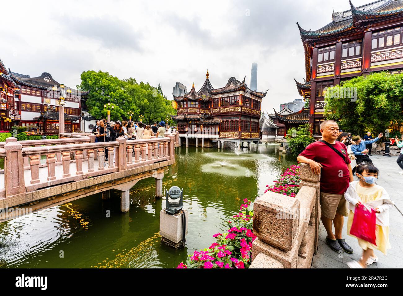 Yuyuan Garden bazaar area with the winding bridge and Huxinting ...