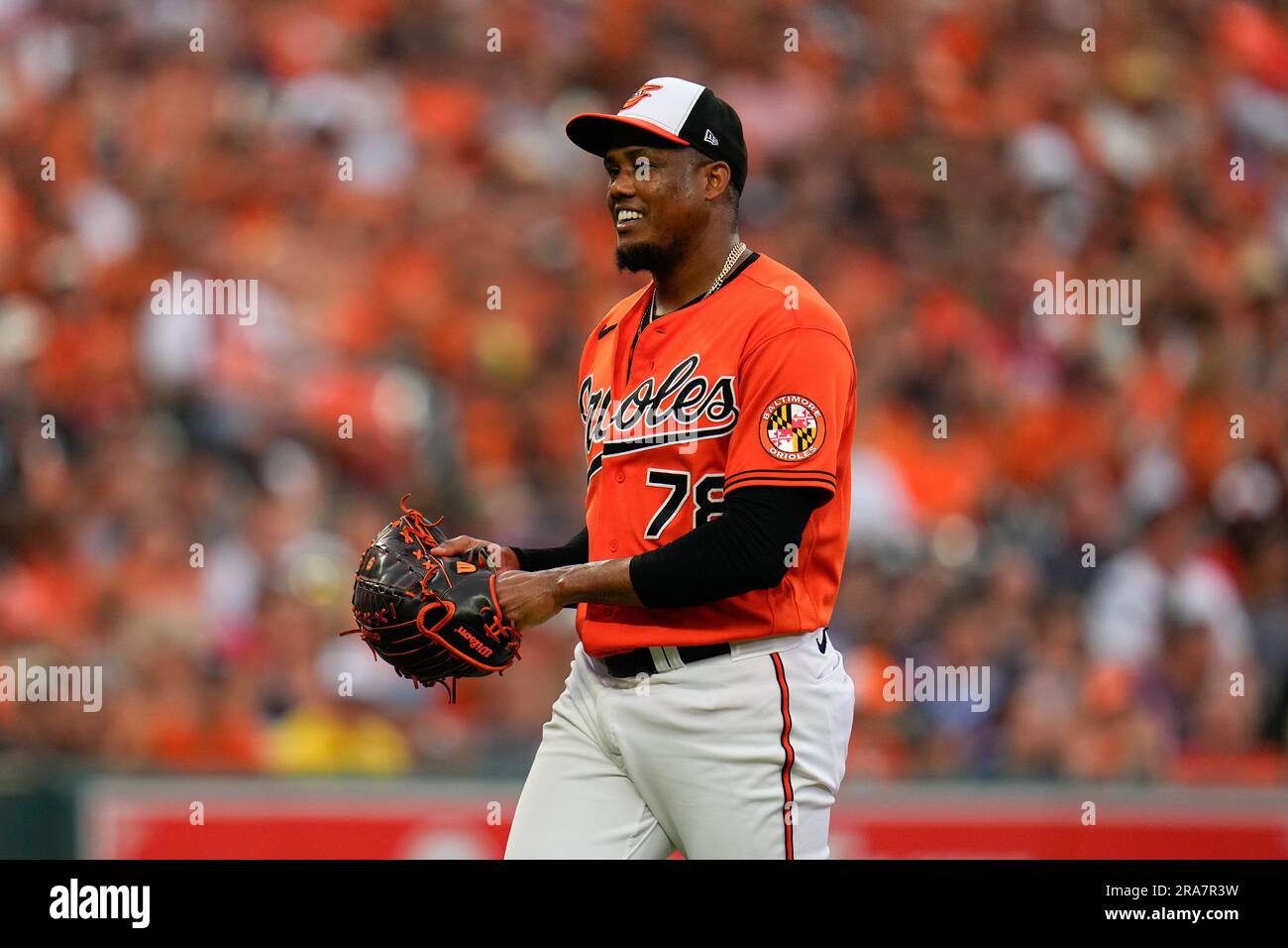 Baltimore Orioles relief pitcher Yennier Cano reacts after pitching to ...