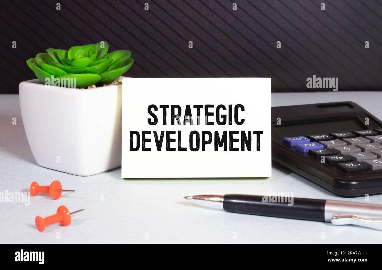 text strategic development on white business card Stock Photo - Alamy