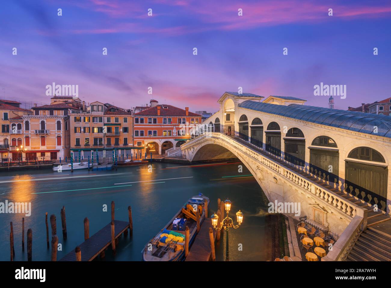 Venice, Italy at the Rialto Bridge over the Grand Canal at twilight ...
