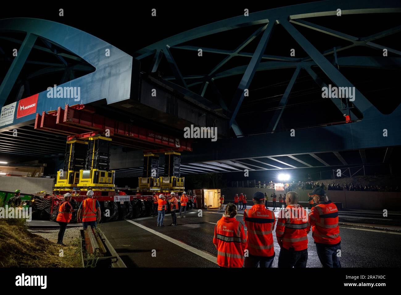 Eggolsheim, Germany. 01st July, 2023. Several workers in orange high ...
