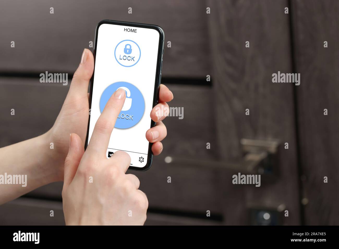 Woman unlocking door using mobile phone, closeup. Illustration of ...