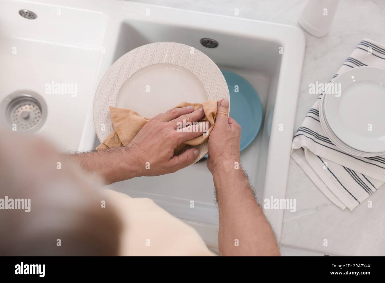 Wiping the sink hi-res stock photography and images - Alamy