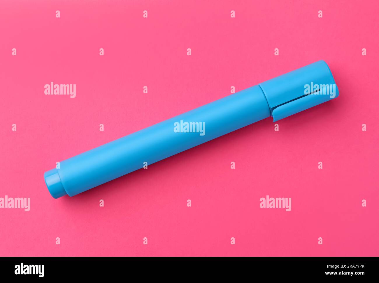 Bright light blue marker on pink background, top view Stock Photo - Alamy