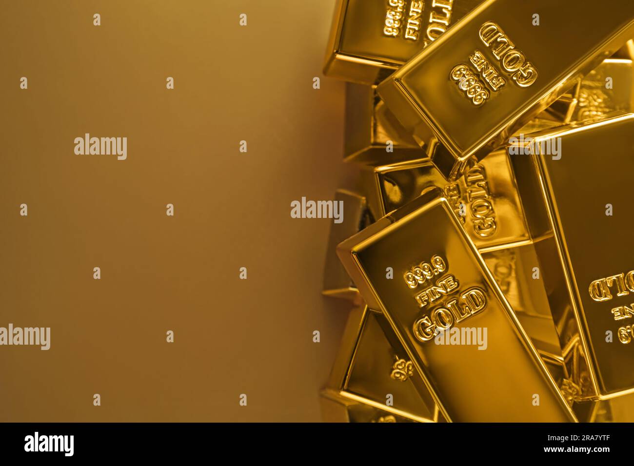 Many shiny gold bars on color background, flat lay. Space for text Stock Photo - Alamy