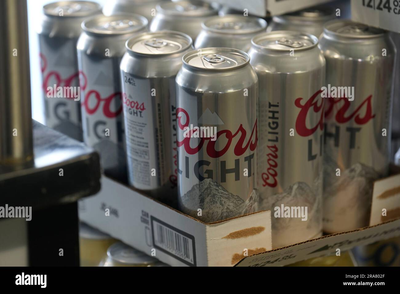 Cans of Coors Light wait to be iced at a concession stand on the main ...