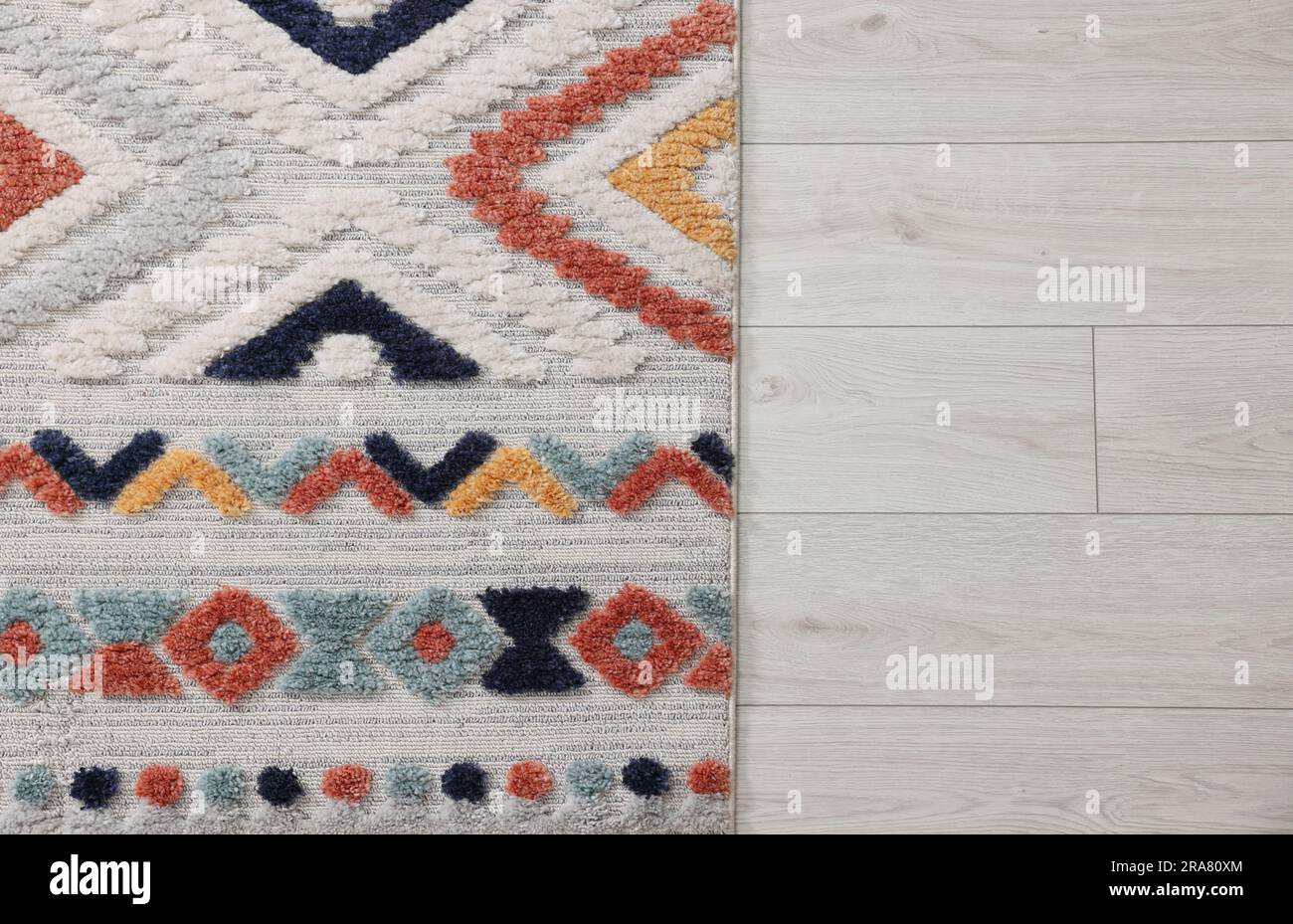 Carpet with beautiful pattern on floor, top view. Space for text Stock ...