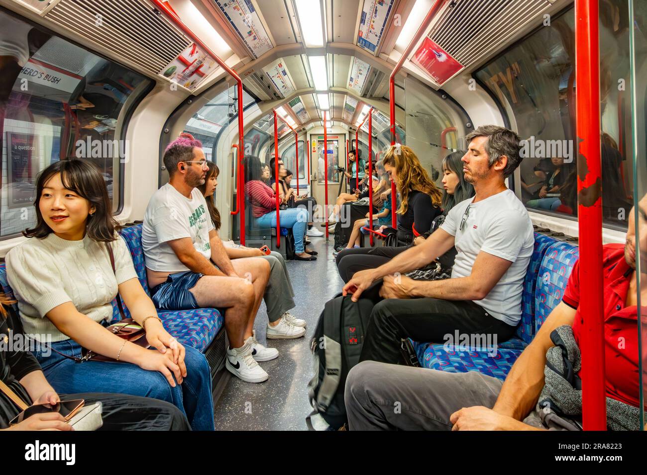 People travelling on a London Underground Central Line train. An ... People travelling on a London Underground Central Line train. An ...