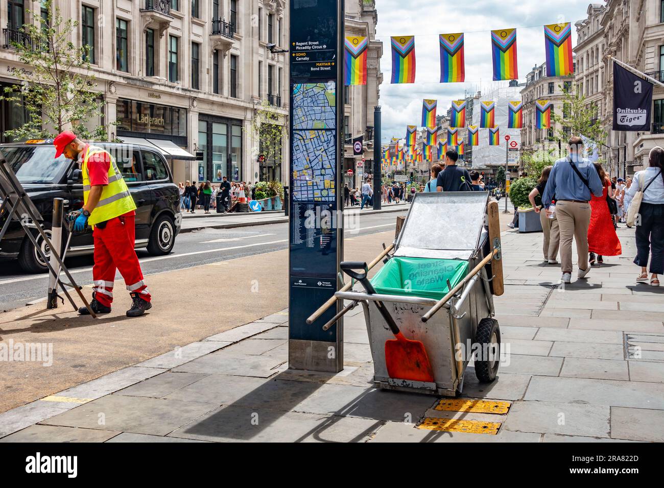 A street cleaner picks up litter on Regent Street which is shut to ...