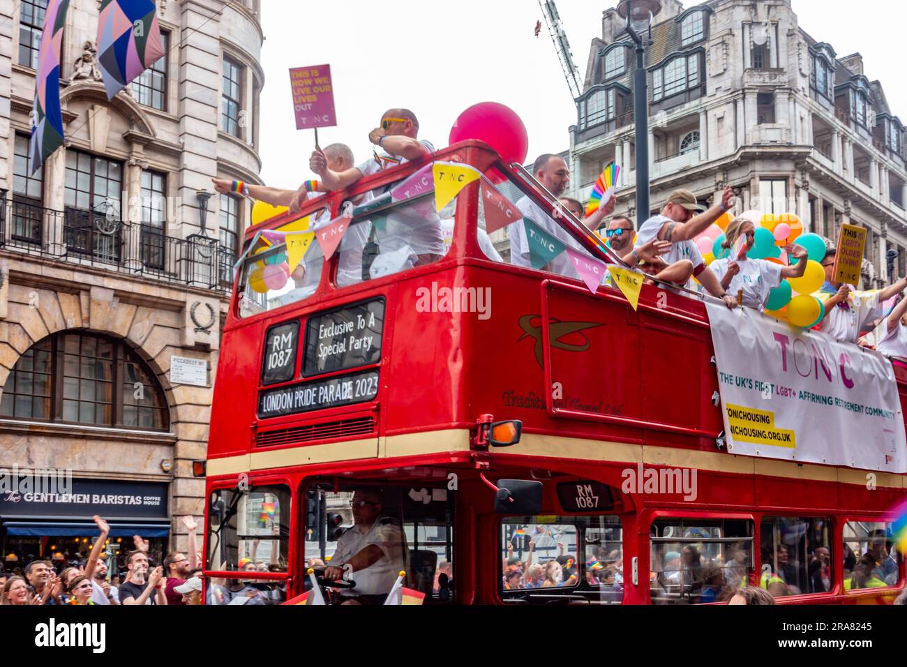 Participants in the annual London Pride event in July 2023 travel on an ...