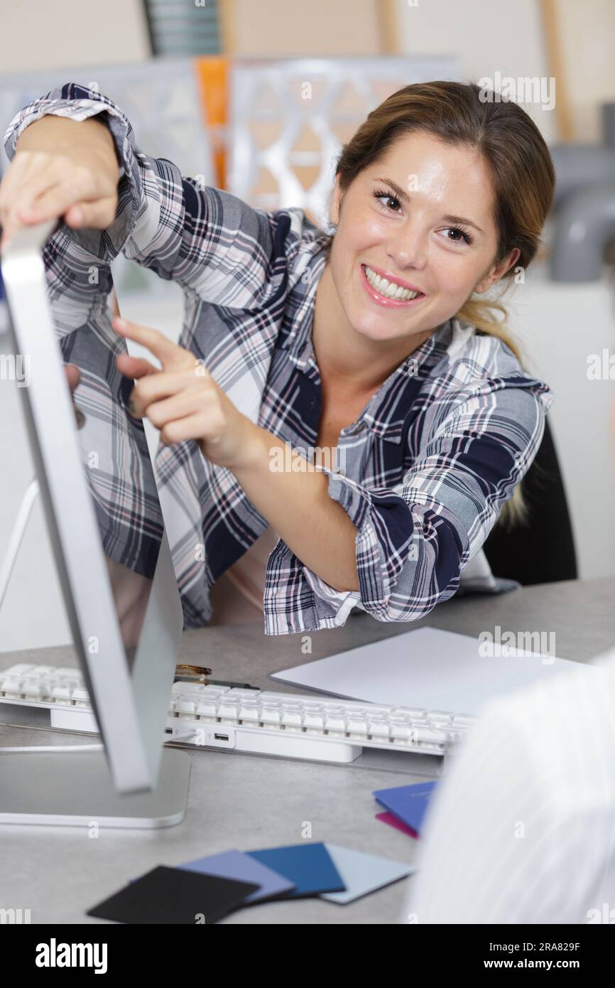 smiling customer support agent woman talking to customer Stock Photo ...