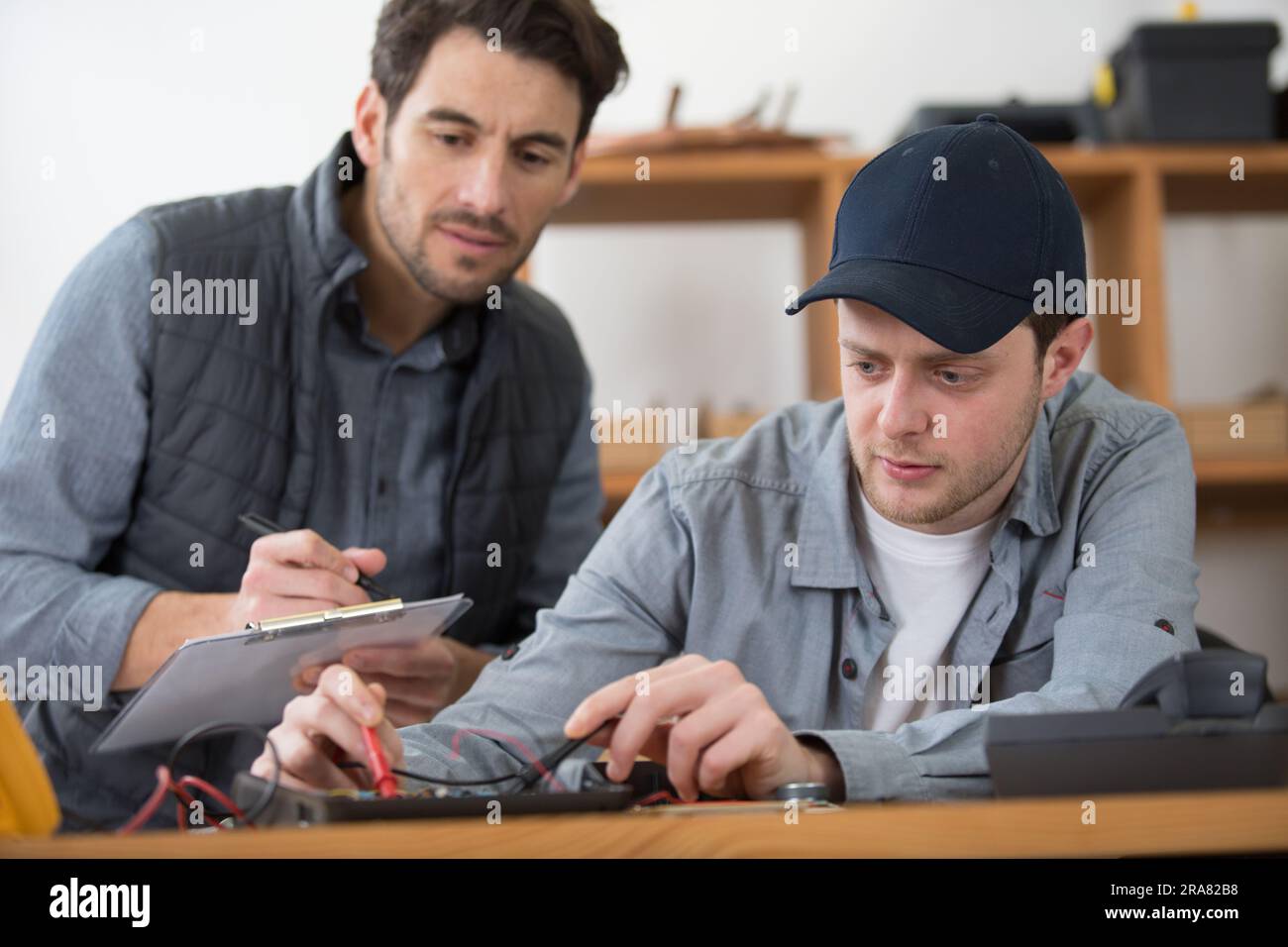 portrait of student being marked Stock Photo - Alamy