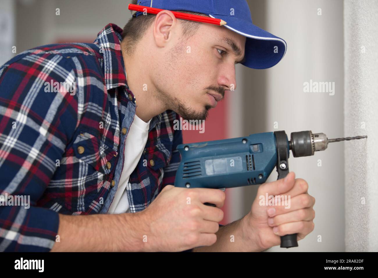 Man using power drill hi-res stock photography and images - Alamy