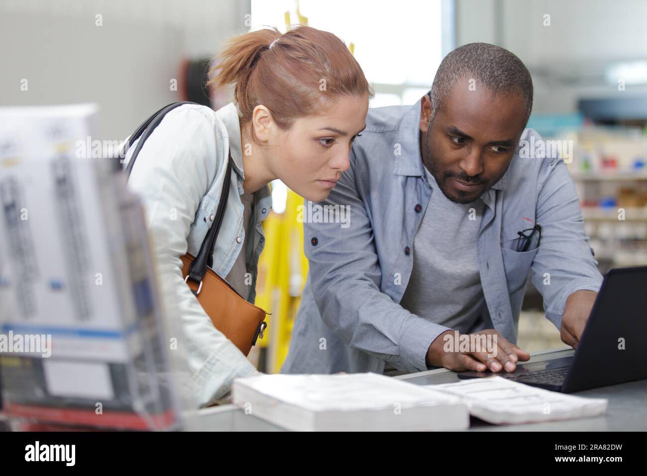 Man woman in overalls discussing hi-res stock photography and images ...