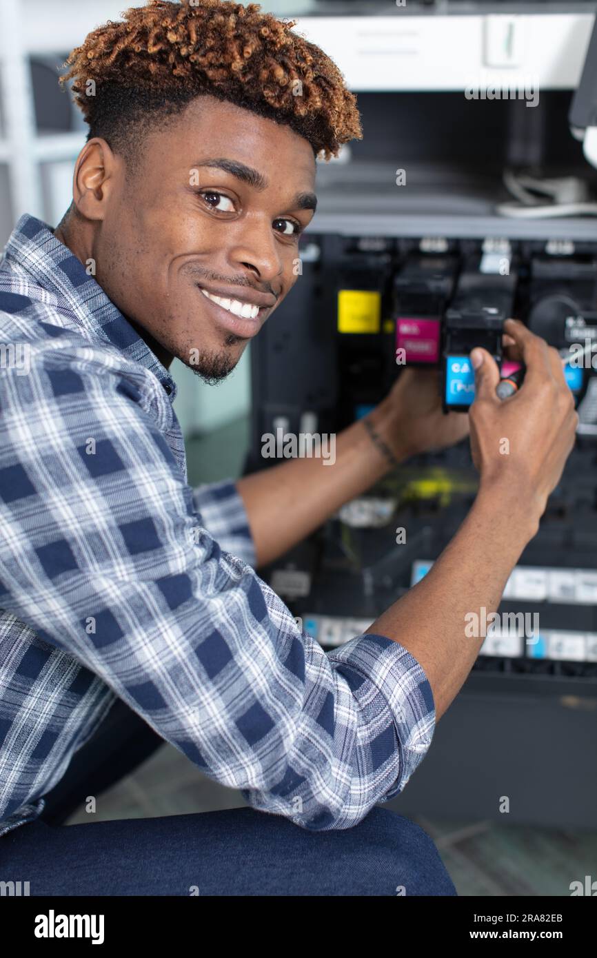 Technician man repairing photocopy hi-res stock photography and images ...