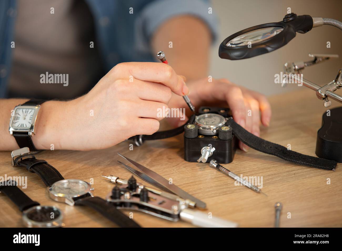 pocket watch being repaired by watch maker Stock Photo - Alamy