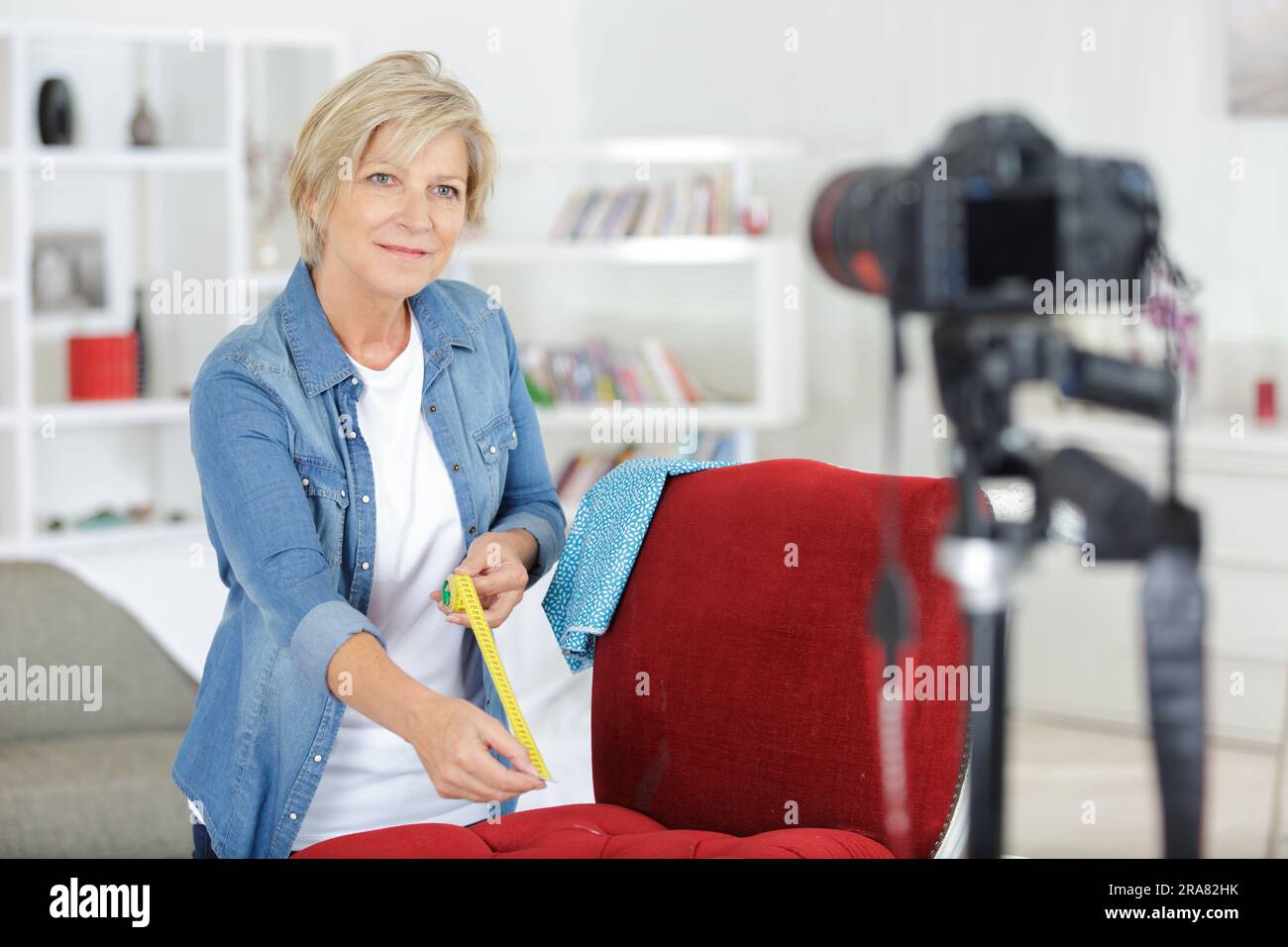 mature woman filming a craft blog Stock Photo - Alamy