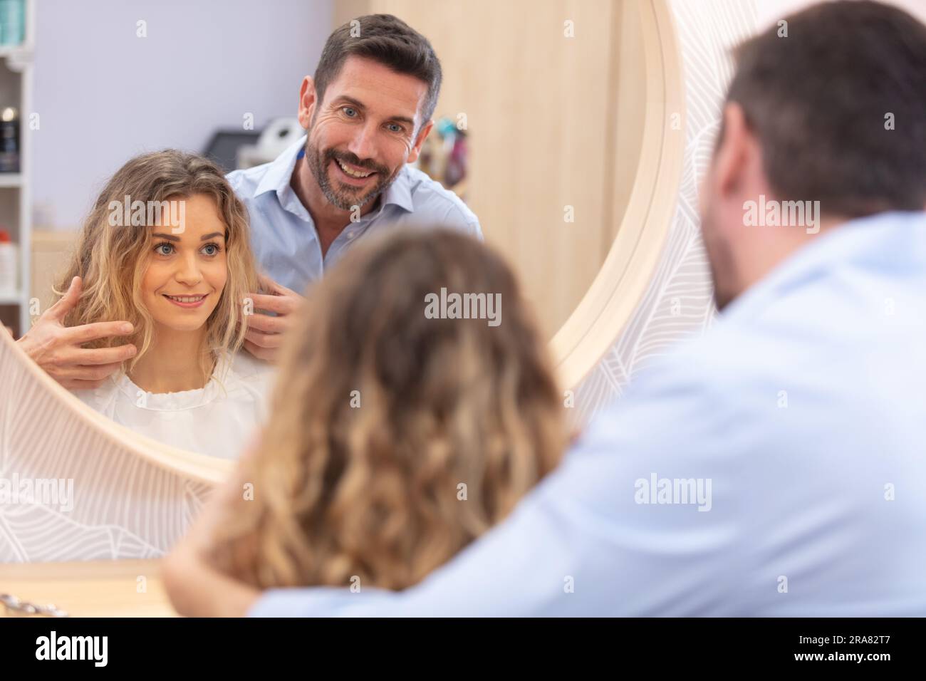 Hairdresser client discussing hi-res stock photography and images - Alamy