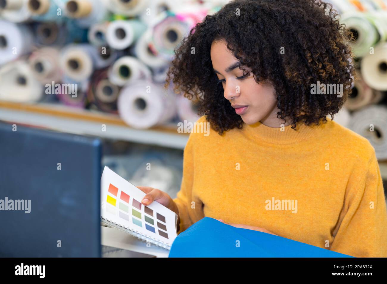 designer of clothes with color swatches Stock Photo - Alamy