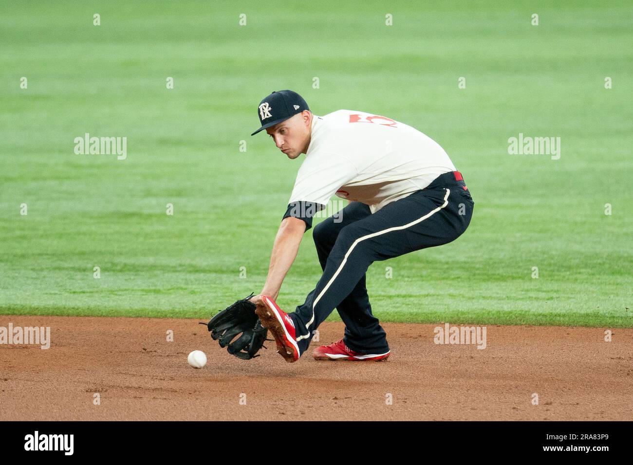 ARLINGTON, TX - JULY 1: Texas Rangers shortstop Corey Seager (5) fields ...