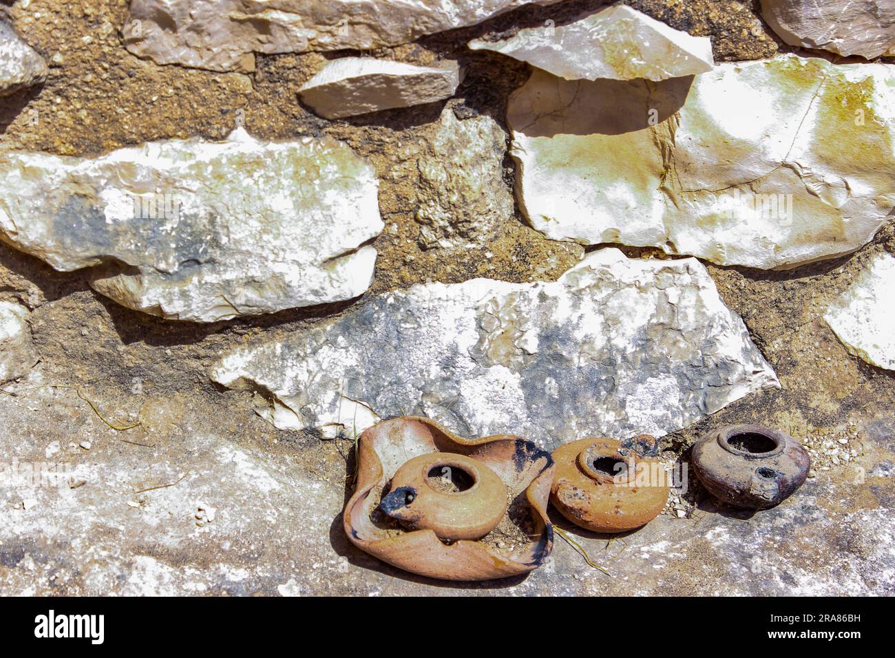 Three oil lamps lying on the ground at Nazareth Village Open Air Museum ...