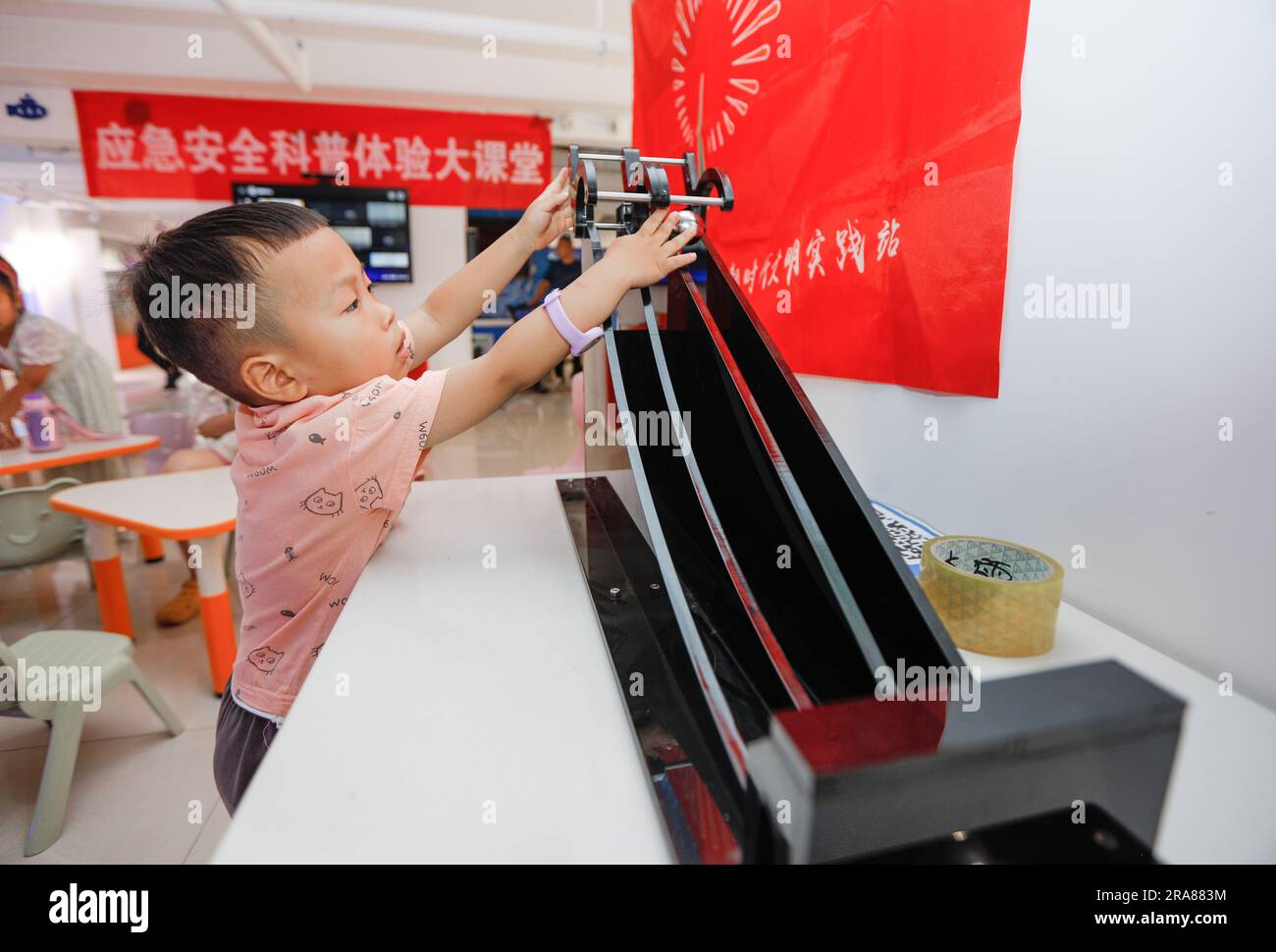 JINAN, CHINA - JULY 1, 2023 - A child experiences popular science ...