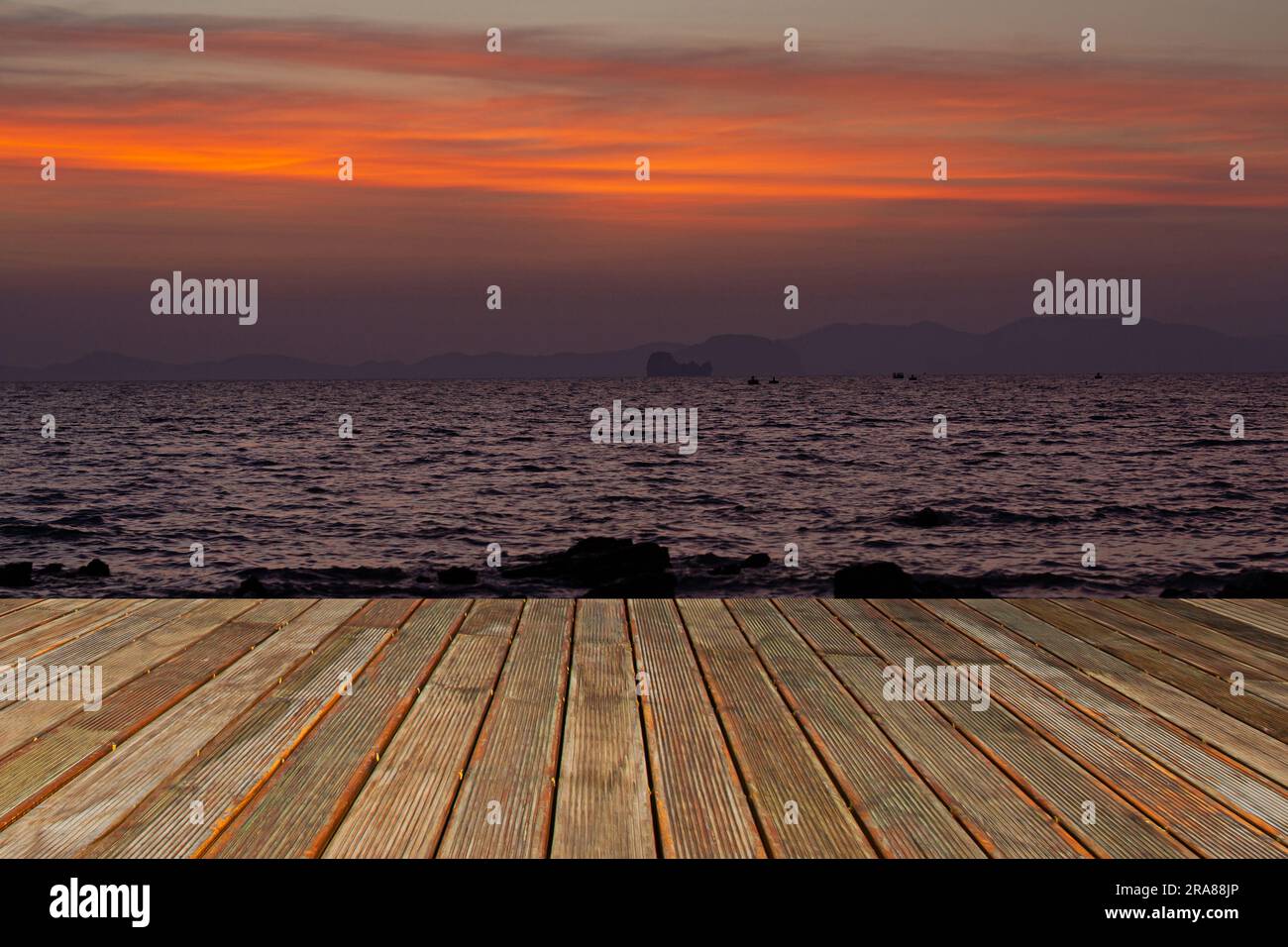 beautiful wooden floor and orange sky sunset background Stock Photo - Alamy