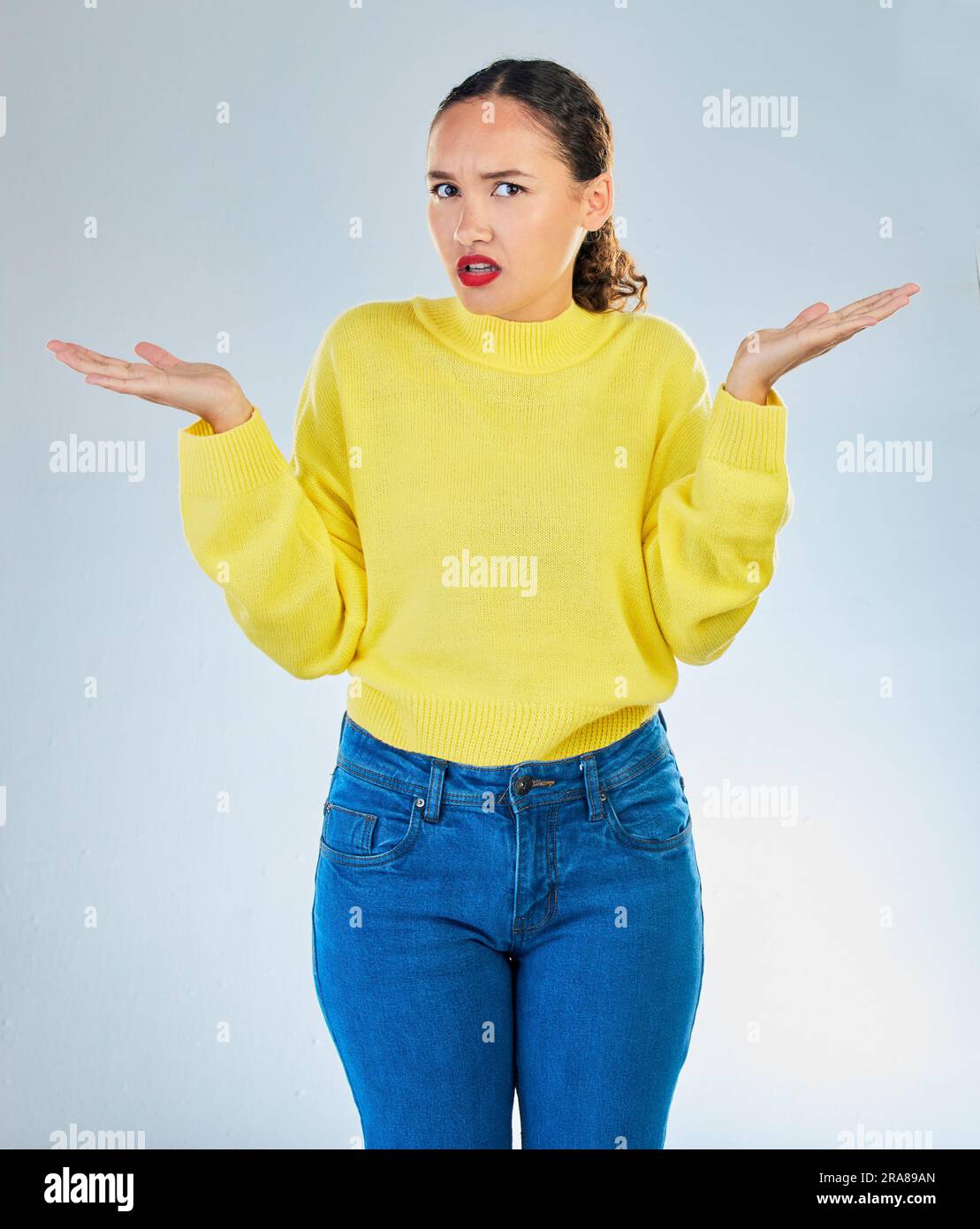 Portrait, shrug and woman confused, question and decisions against a ...