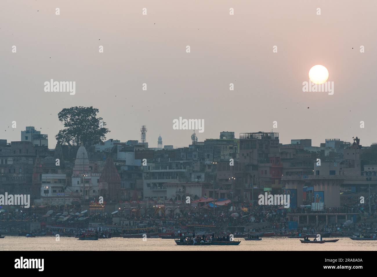 Night view of the palaces on the banks of the Ganges River in Varanasi ...