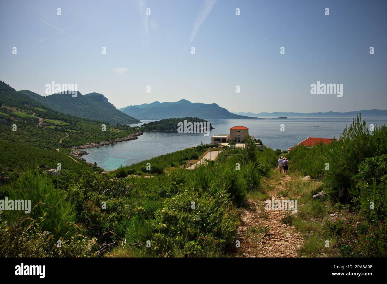 Hiking above the deep bay of Adriatic sea on Peljesac peninsula ...