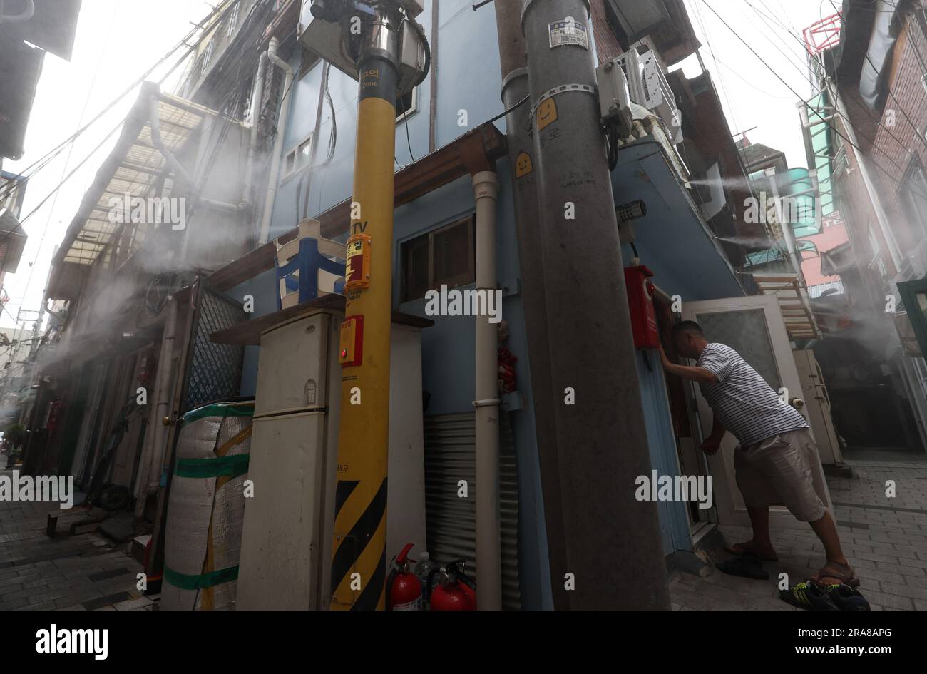 02nd July, 2023. Cooling mist to fight heat wave Cooling mist is ...