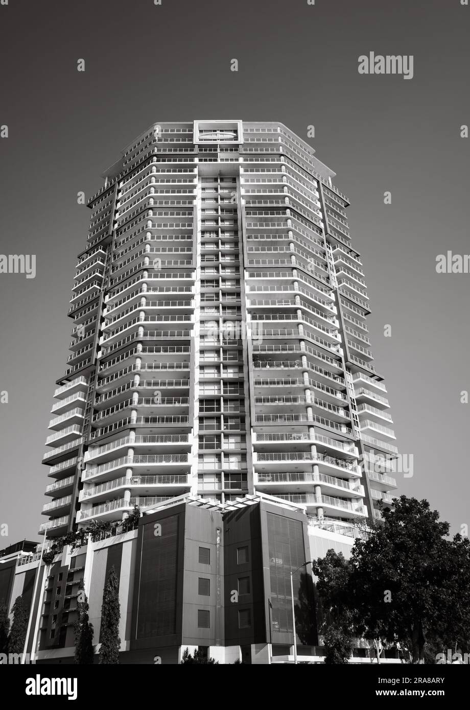 A low angle photograph of Darwin City's tallest building in black and ...