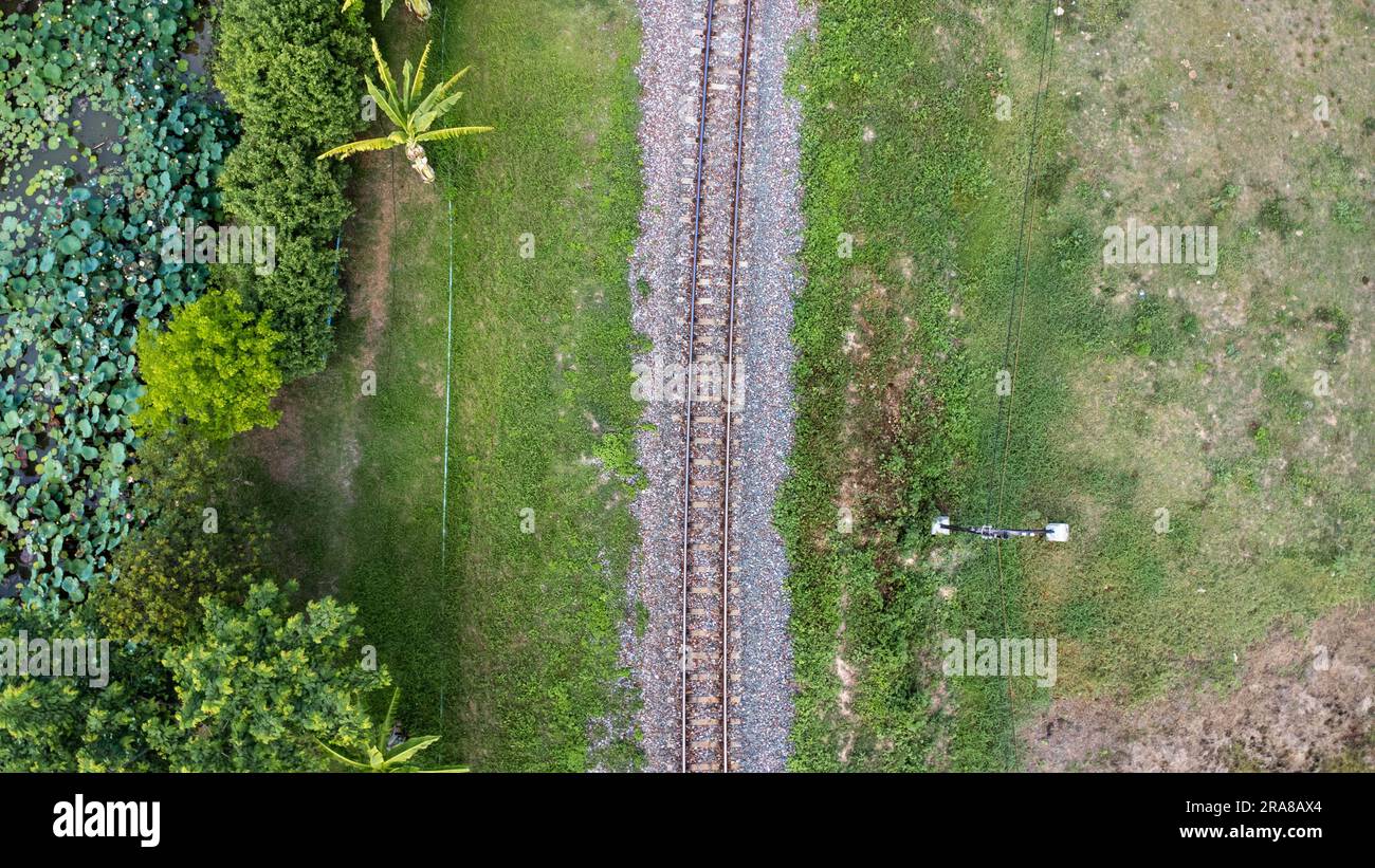 Aerial view of the railway in the park. Top view of the railroad from a ...