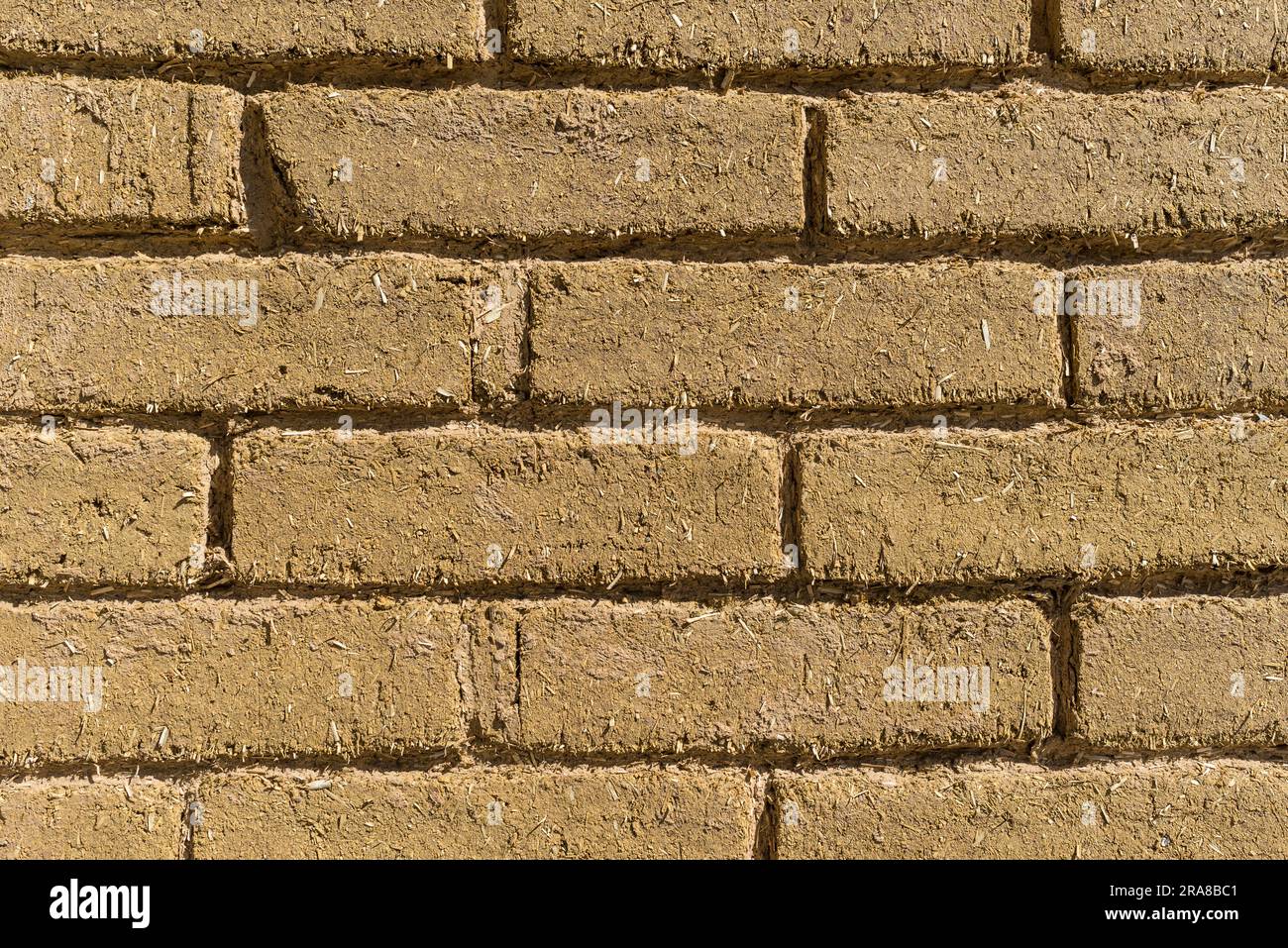 The brick from clay and straw, is laid out on all background, clay bricks for building clay ...